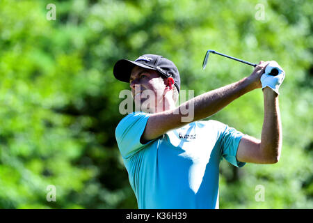 Webb Simpson plays during the first round of the Rocket Mortgage ...