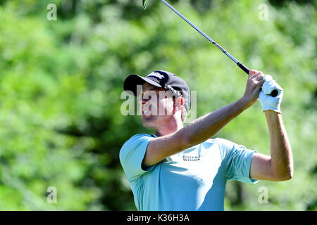 Webb Simpson plays during the first round of the Rocket Mortgage ...