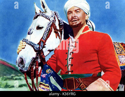 KIM 1950 MGM film with Errol Flynn as Mahbub Ali and Dean Stockwell as the boy Kim Stock Photo ...