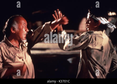 THE KARATE KID Ralph Macchio as Daniel LaRusso, Pat Morita as Mr ...