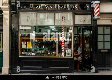 Busy barbers shop Stock Photo - Alamy
