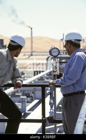 Saudi Aramco engineers at the Shaybah Gas Oil Separation Plant (GOSP ...