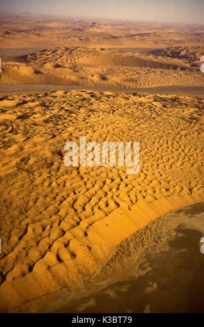 Massive red sand dunes at Saudi Aramco's Shaybah field, a major gas and ...