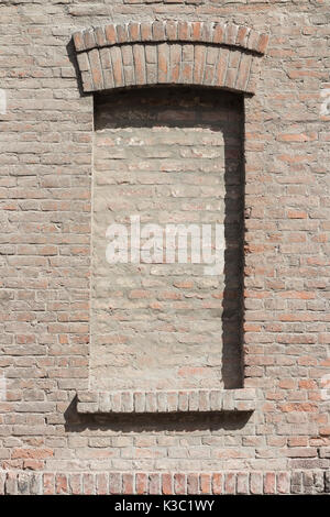 abandoned stone walled house with decorative ceiling seen through ...