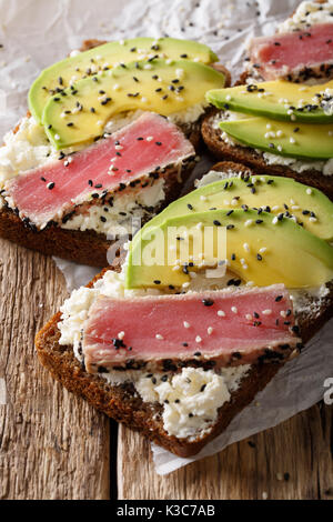 Sandwich with cream cheese, tuna and sesame seeds Stock Photo - Alamy