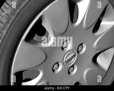 Monochrome Nissan Micra wheel hub cap and tyre Stock Photo - Alamy