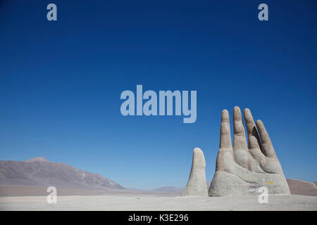 Hand sculpture in the Atacama desert in Northern Chile Stock Photo - Alamy