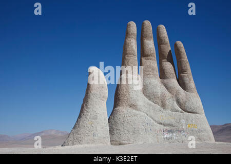 Hand sculpture in the Atacama desert in Northern Chile Stock Photo - Alamy