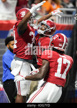 Alabama wide receiver Robert Foster (8) gains several yards before ...