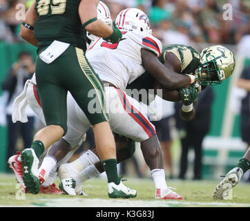 South Florida running back Sam Franklin (4) carries the ball against ...