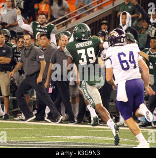 Hawaii defensive back Trayvon Henderson (39) runs an interception back ...