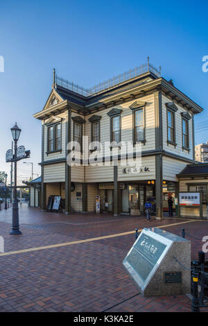 Japan, Shikoku, Matsuyama. Famous Dogo Onsen. Building with illuminated ...