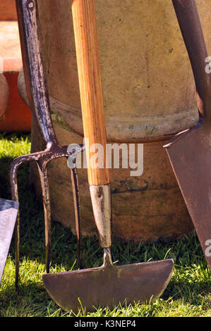 garden tools and axes choppers spades and forks to dig the garden and ...