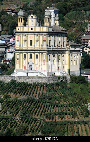 The Santa Casa in Tresivio surrounded by apples tres where apples are ...
