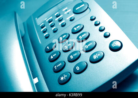 office dialing telephone with led screen Stock Photo - Alamy