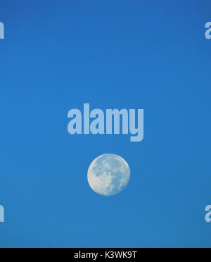 Moon surface and a big planet background Stock Photo - Alamy