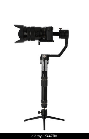 Videographer using gimbal stabilizer with camera on light blue background, closeup Stock Photo ...