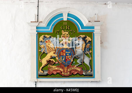 The royal crest of King George III on one of the two 'noon gun' cannons ...