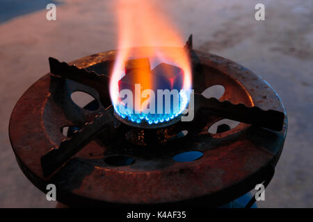 Charcoal for shisha on a gas burner Stock Photo - Alamy