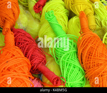 collection of spool of colorful color sewing thread used in fabric and ...