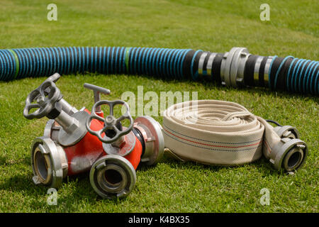 fire brigade, hose, rolled, unrolled, fire brigade, hose, rolled ...
