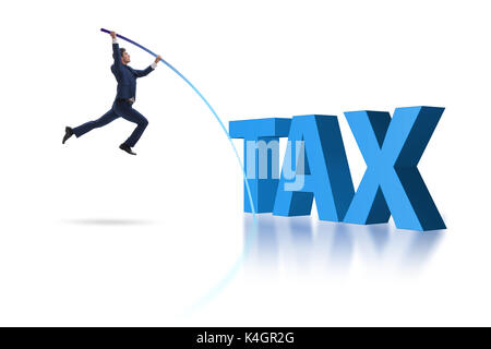 Businessman vault jumping over tax Stock Photo - Alamy