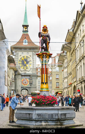 Shopping alley with the famous clocktower of Bern in Switzerland Stock ...