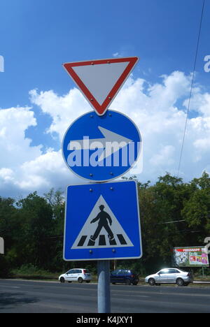road signs indicating a one-way street with contraflow cycle land and ...