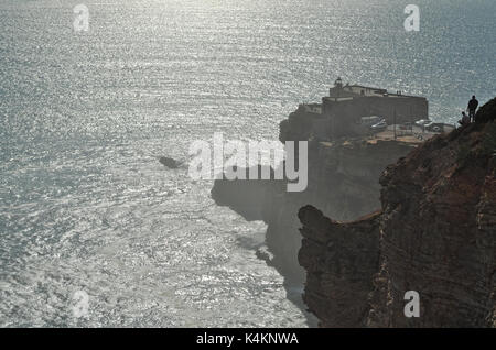 View of the Lighthouse of Nazare (Nazareth) from the cliffs. Portugal ...