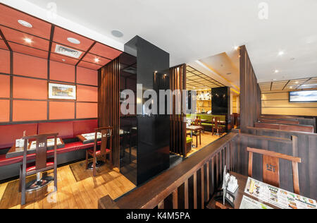 The interior is modern Japanese restaurant Ichiban Boshi. The main hall ...