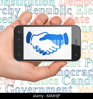 Politics concept: Smartphone with Handshake on display Stock Photo - Alamy