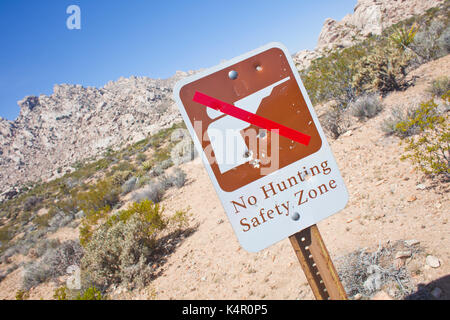 A Safety Zone, No Hunting or Shooting sign Stock Photo - Alamy