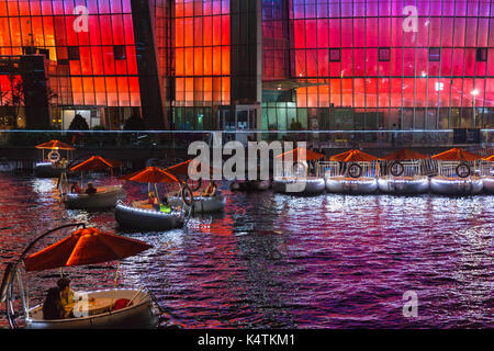 After dark, poeple enjoy taking out floats on the Han river at ...