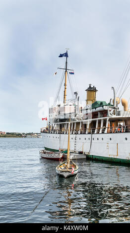 A steam powered frigate with mast tied up to dock in Halifax, Nova ...