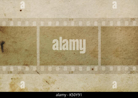 Film negative frames on brown background Stock Photo - Alamy
