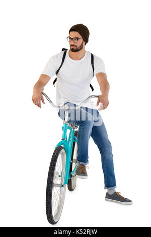 Handsome man posing with bicycle against white background Stock Photo ...