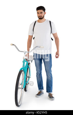 Handsome man posing with bicycle against white background Stock Photo ...