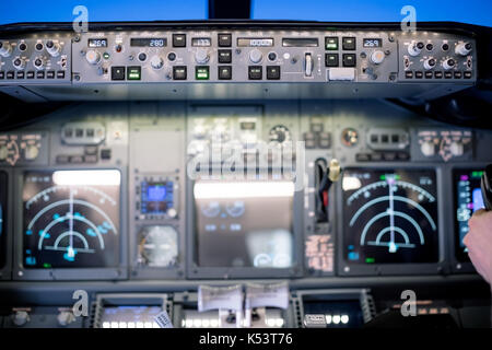 Screens in an airplane cockpit - the control panel for directions, fuel ...