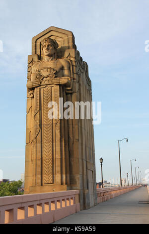 Ohio, Cleveland. The Hope Memorial Bridge. Huge Art Deco statues called ...