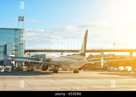 Plane at the airport terminal. Boarding started Stock Photo - Alamy