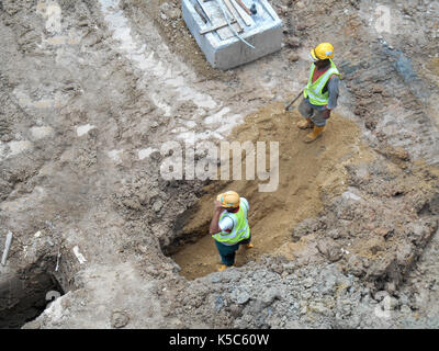 Workers laid water system pipeline at construction site. City ...