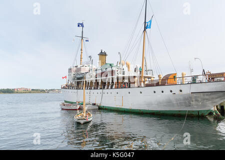 A steam powered frigate with mast tied up to dock in Halifax, Nova ...