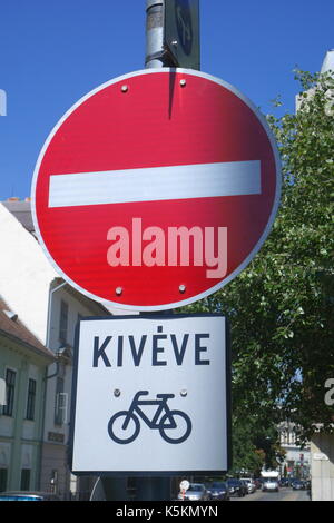 No entry sign except for cyclists and St Paul protestant church's rose ...