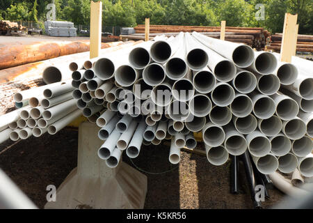 Storage rack with plastic pipes Stock Photo - Alamy