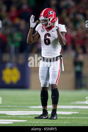Georgia wide receiver Javon Wims (6) makes a catch over Notre Dame ...