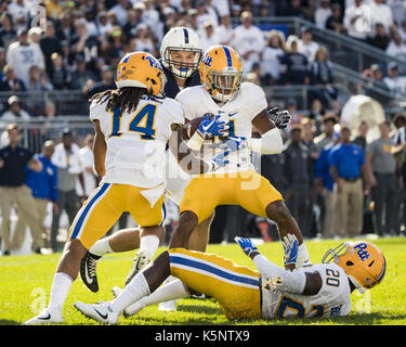 Pittsburgh defensive back Dane Jackson, left, cannot stop a completed ...