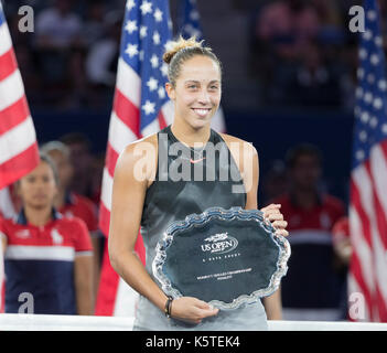 Madison Keys of the U.S., center, holds the Daphne Akhurst Memorial Cup ...