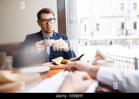 Job Interview Meeting in Cafe Stock Photo - Alamy