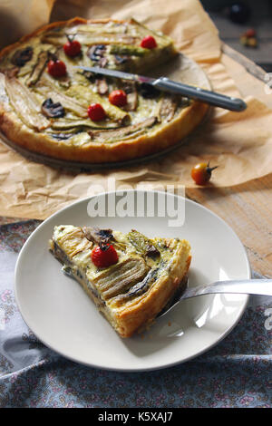 Homemade vegetarian pie with colored vegetables on wooden table Stock ...