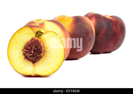 Ripe peaches in a row isolated on white background with clipping path ...